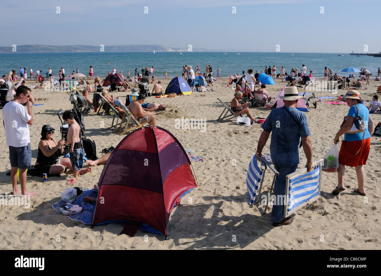 Crowded beach scene at Weymouth a Dorset England seaside resort and ...