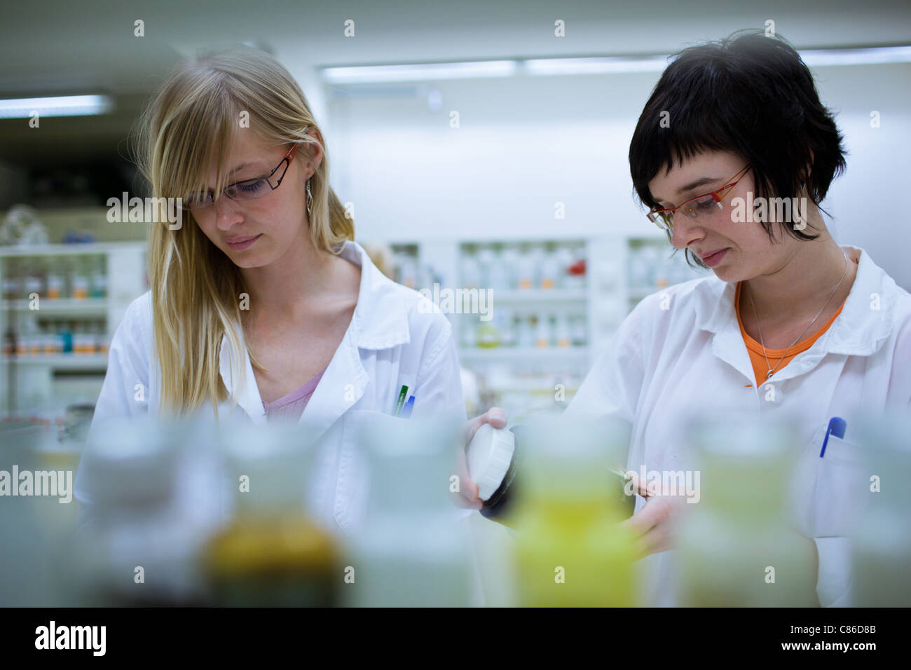 Two female researchers in a chemistry lab Stock Photo - Alamy
