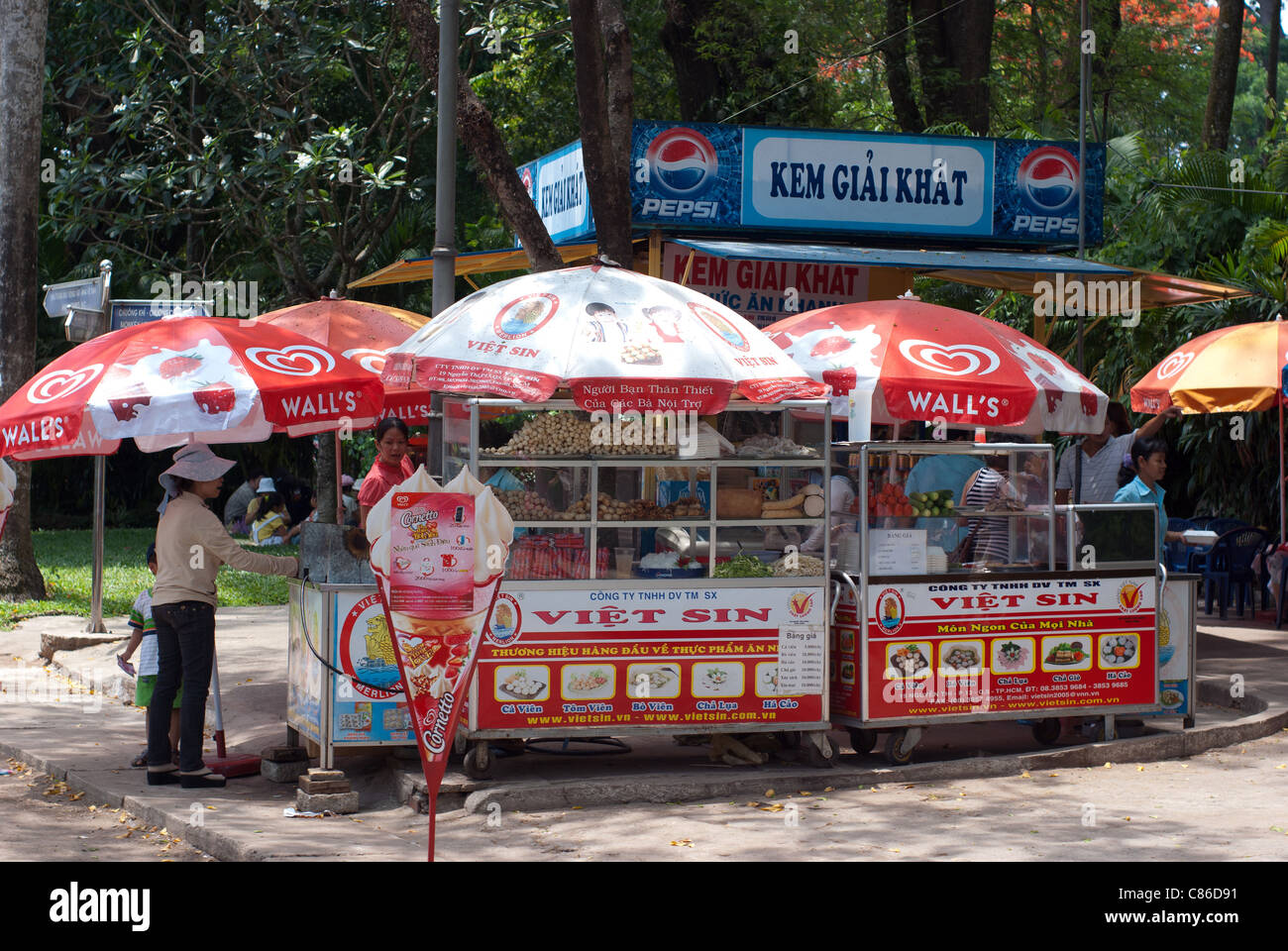 Street food counter in Saigon Vietnam Stock Photo - Alamy