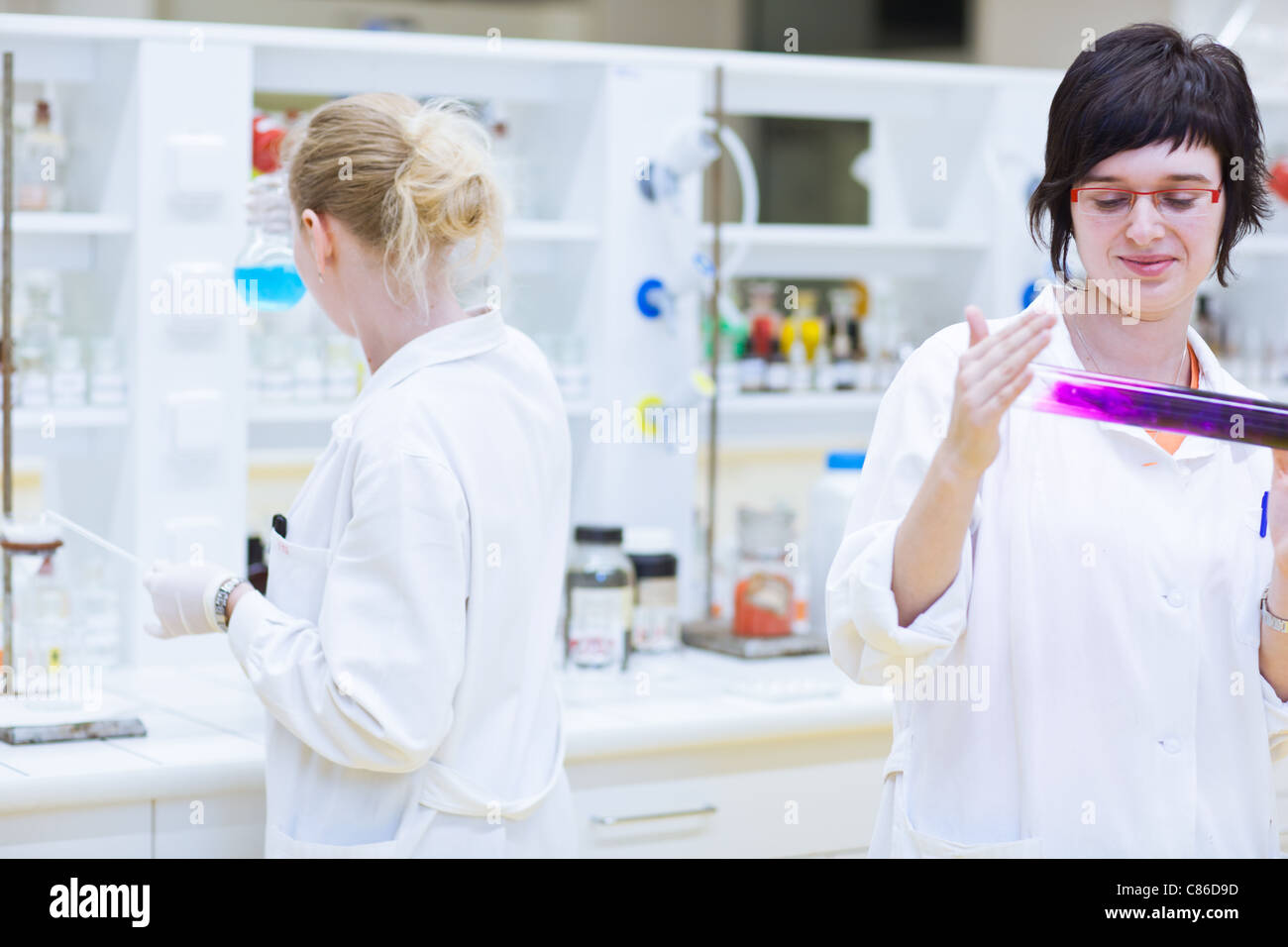 Two female researchers in a chemistry lab Stock Photo - Alamy