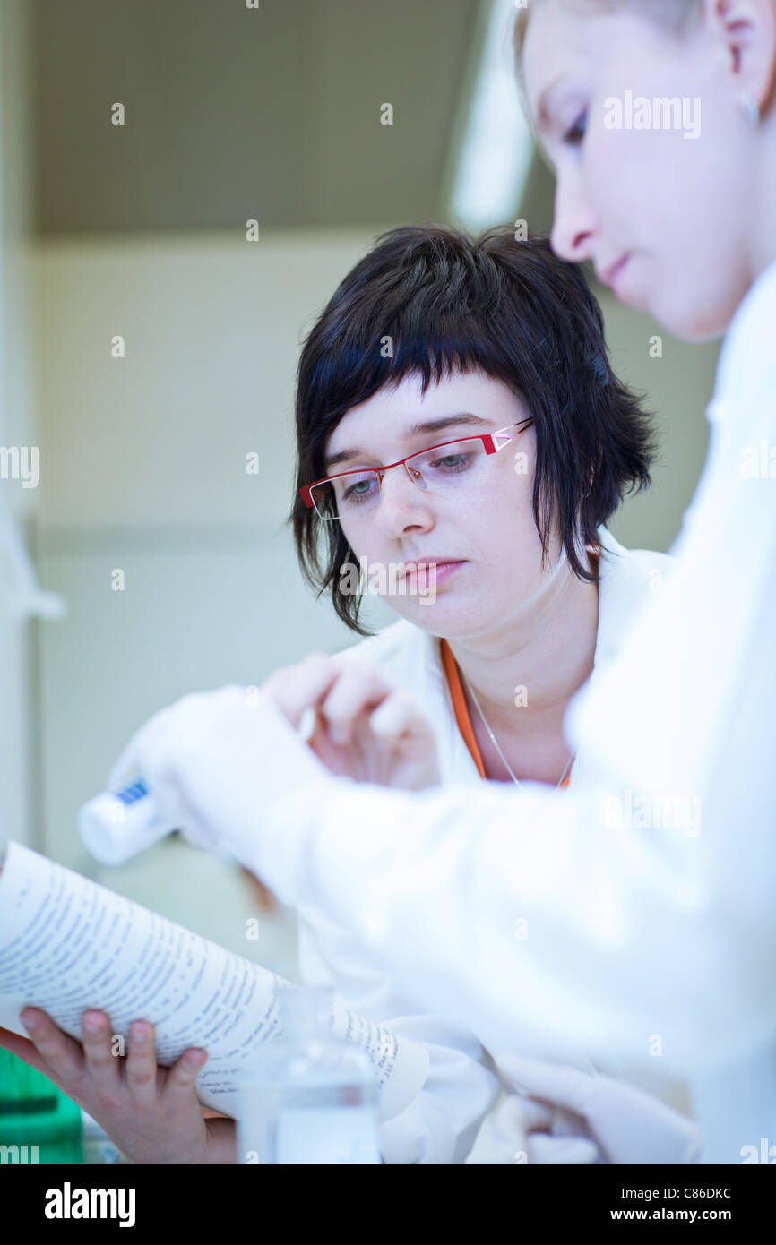 Two female researchers in a chemistry lab Stock Photo - Alamy