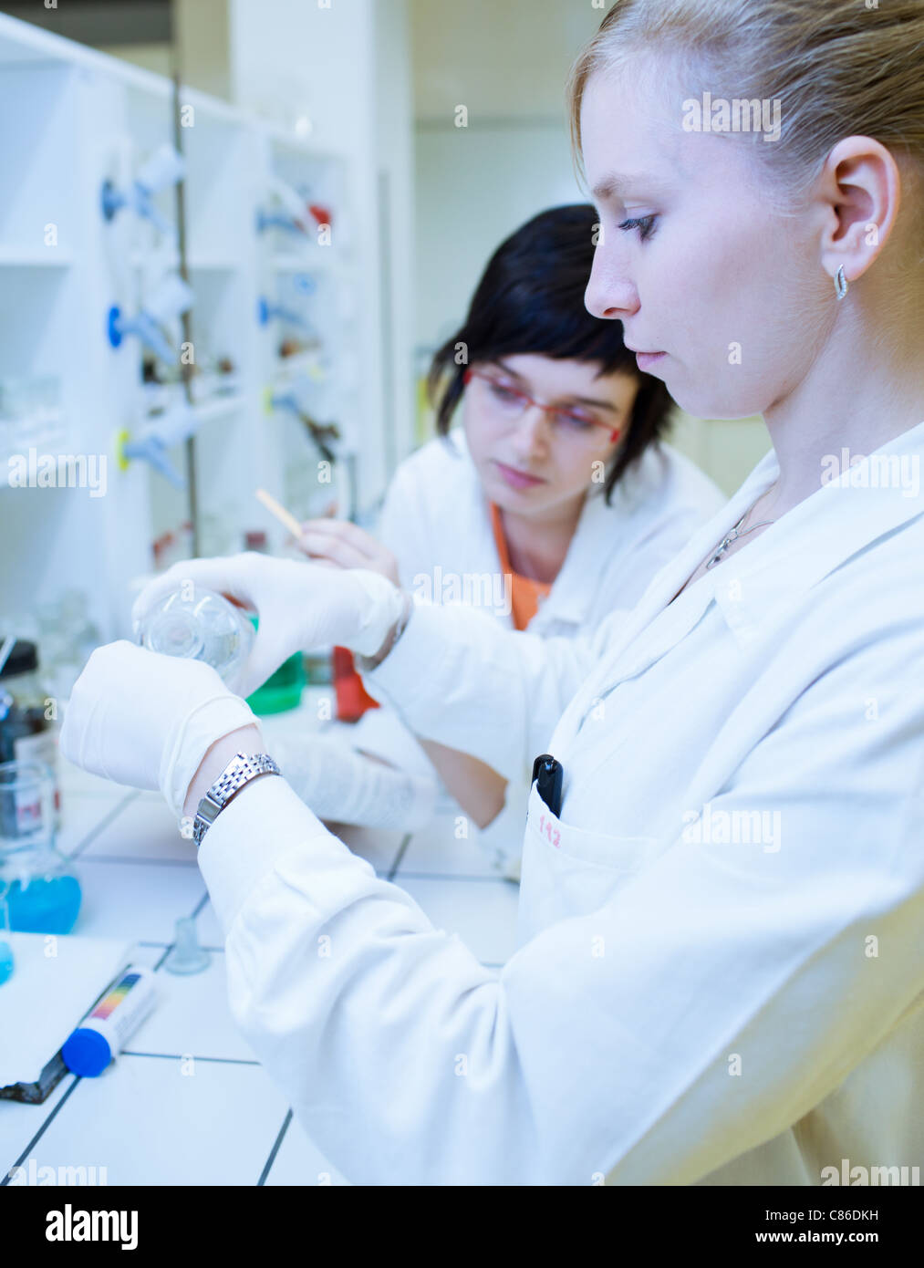 Two female researchers in a chemistry lab Stock Photo - Alamy