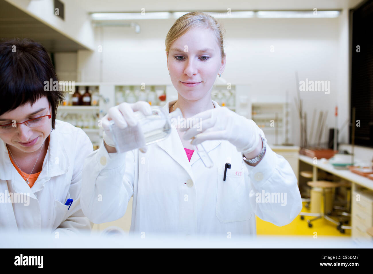 Two female researchers in a chemistry lab Stock Photo - Alamy