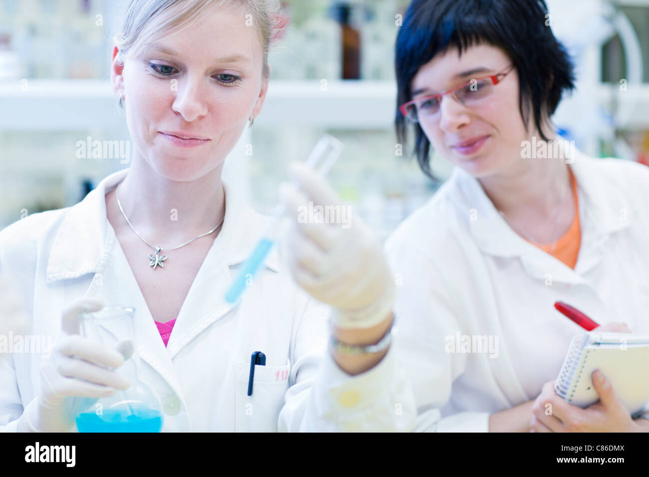 Two female researchers in a chemistry lab Stock Photo - Alamy