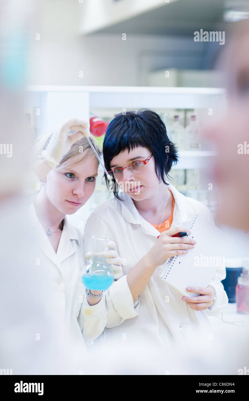 Mixing two colour flask hi-res stock photography and images - Alamy