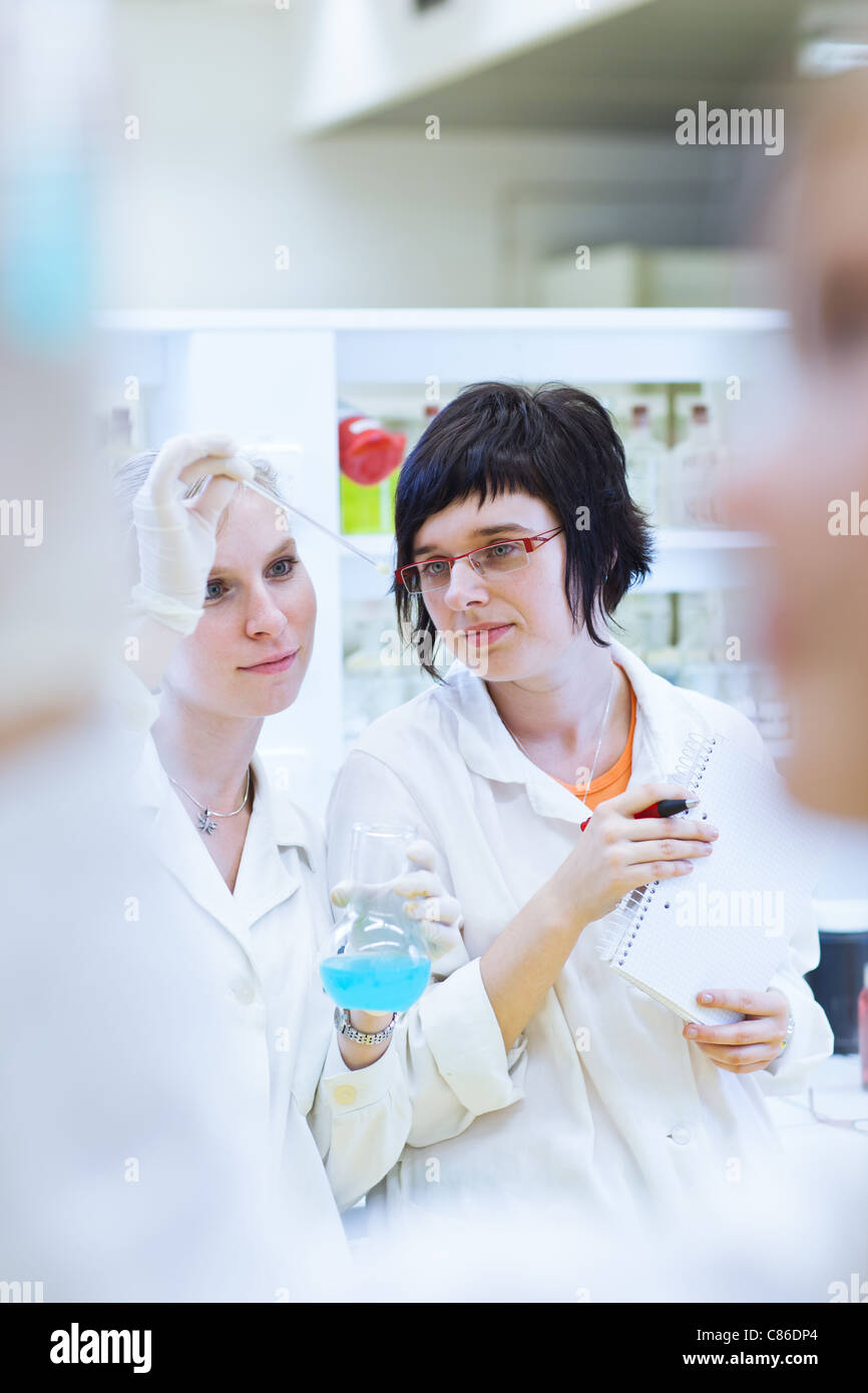 Two female researchers in a chemistry lab Stock Photo - Alamy