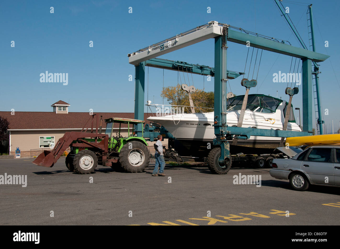Moving boat to dry dock Stock Photo - Alamy