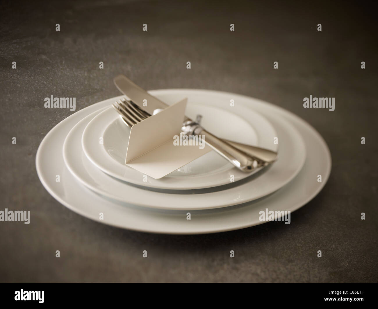 Plate stack/ Place setting Stock Photo - Alamy