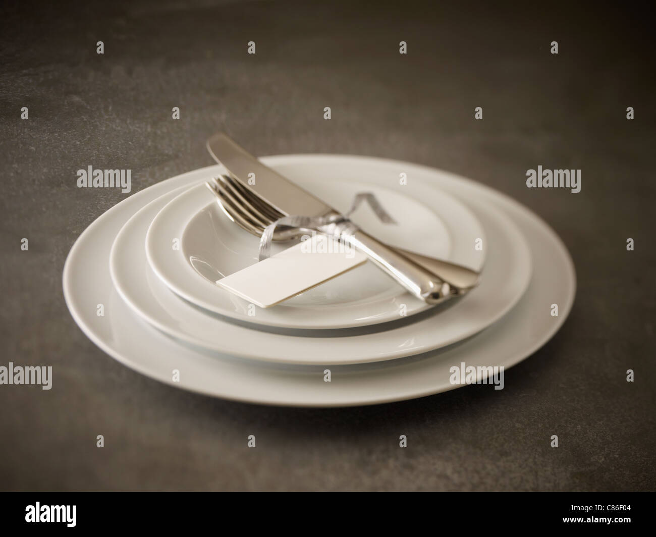 Plate stack/ Place setting Stock Photo - Alamy