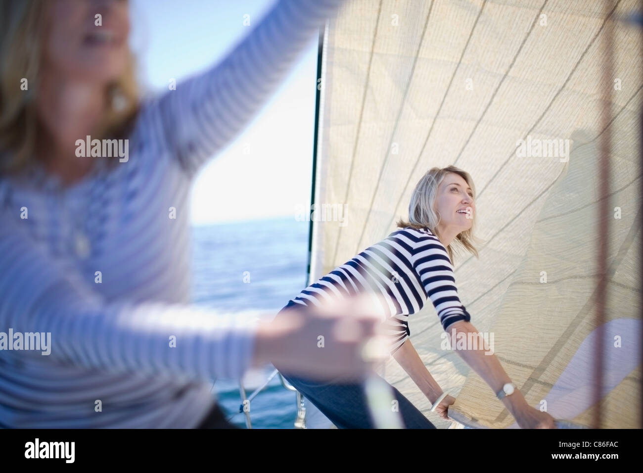 Adjusting sail hi-res stock photography and images - Alamy