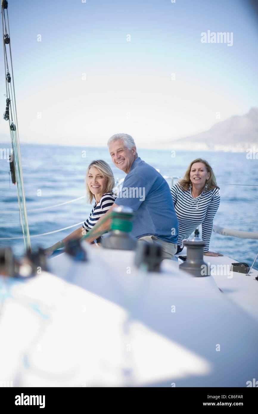 People sitting together on boat Stock Photo - Alamy
