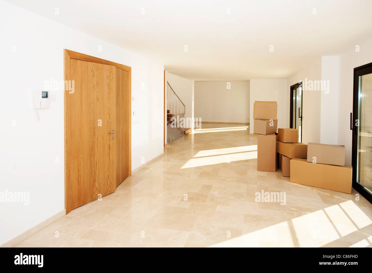 Cardboard Boxes In Modern Living Room Stock Photo Alamy