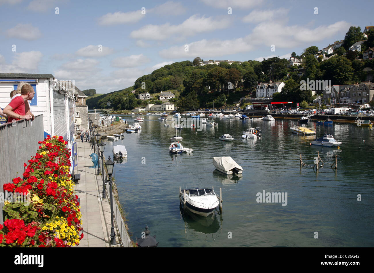 View of the River Looe passing through the popular resort of Looe on ...