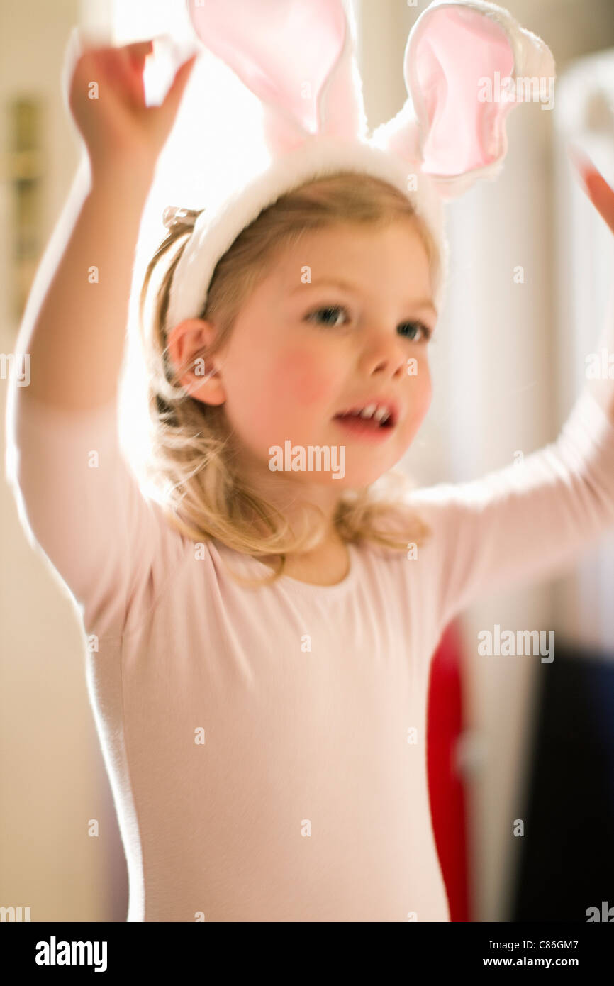 Girl wearing bunny ears Stock Photo - Alamy