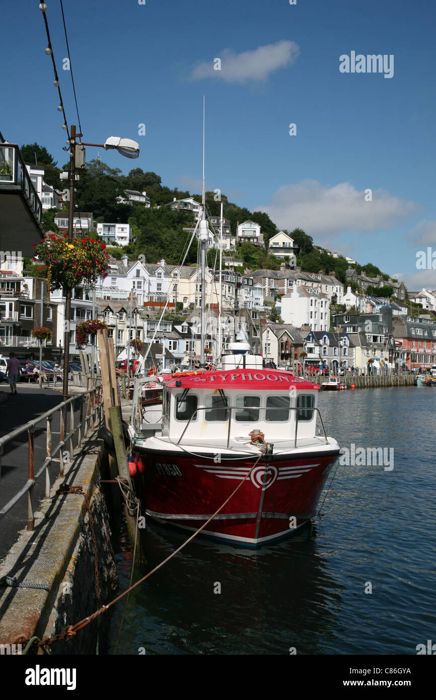 Quayside view of the River Looe passing through the popular resort of ...