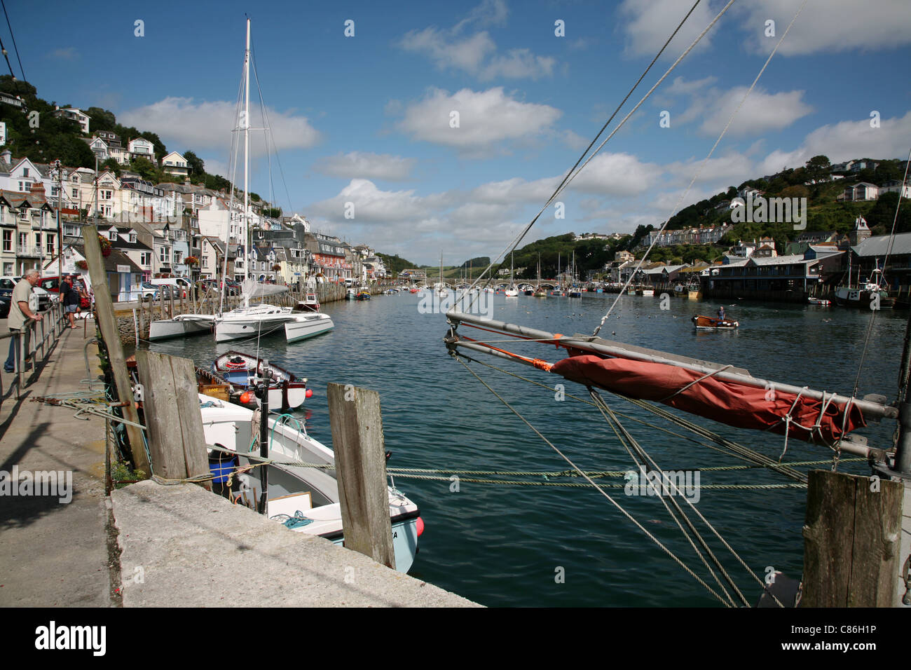 Quayside view of the River Looe passing through the popular resort of ...