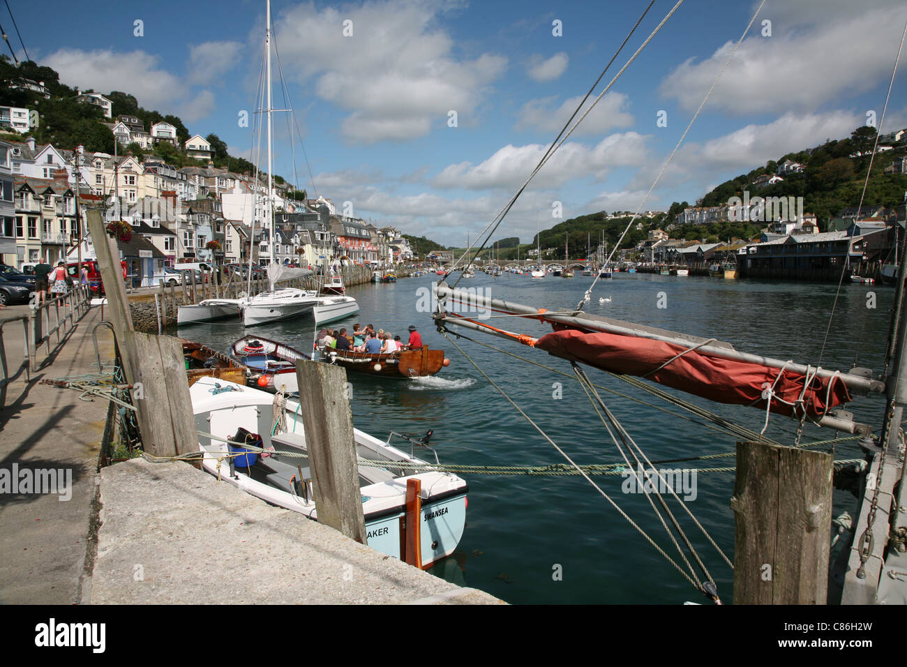 Quayside view of the River Looe passing through the popular resort of ...