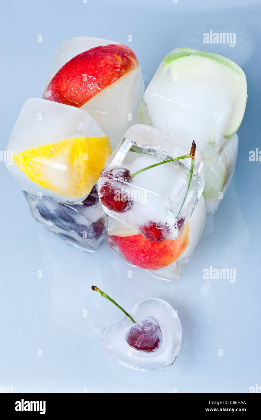 Frozen Fruit on White Background Stock Photo - Alamy