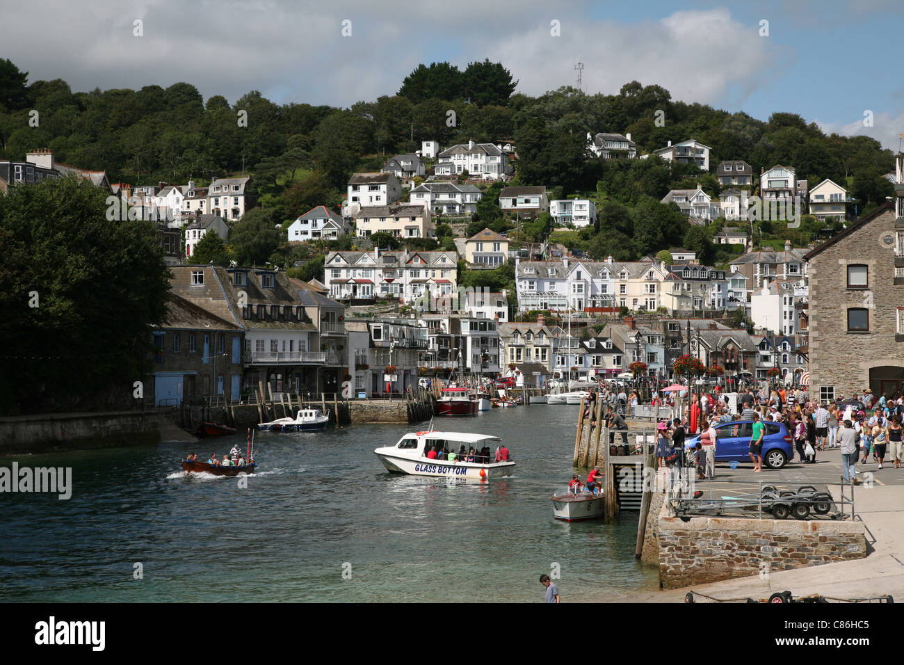 Quayside view of the River Looe passing through the popular resort of ...