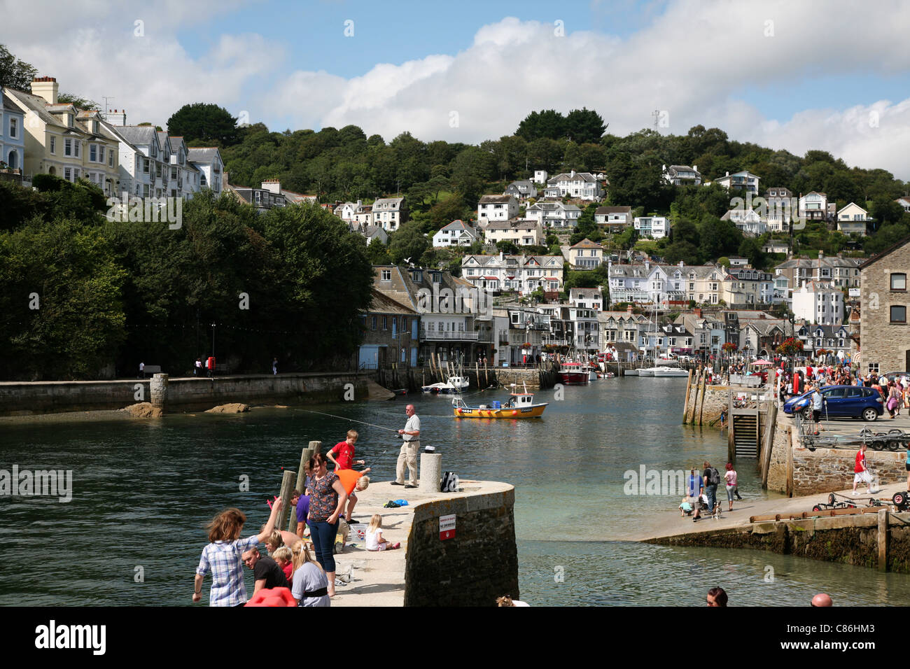 Quayside view of the River Looe passing through the popular resort of ...