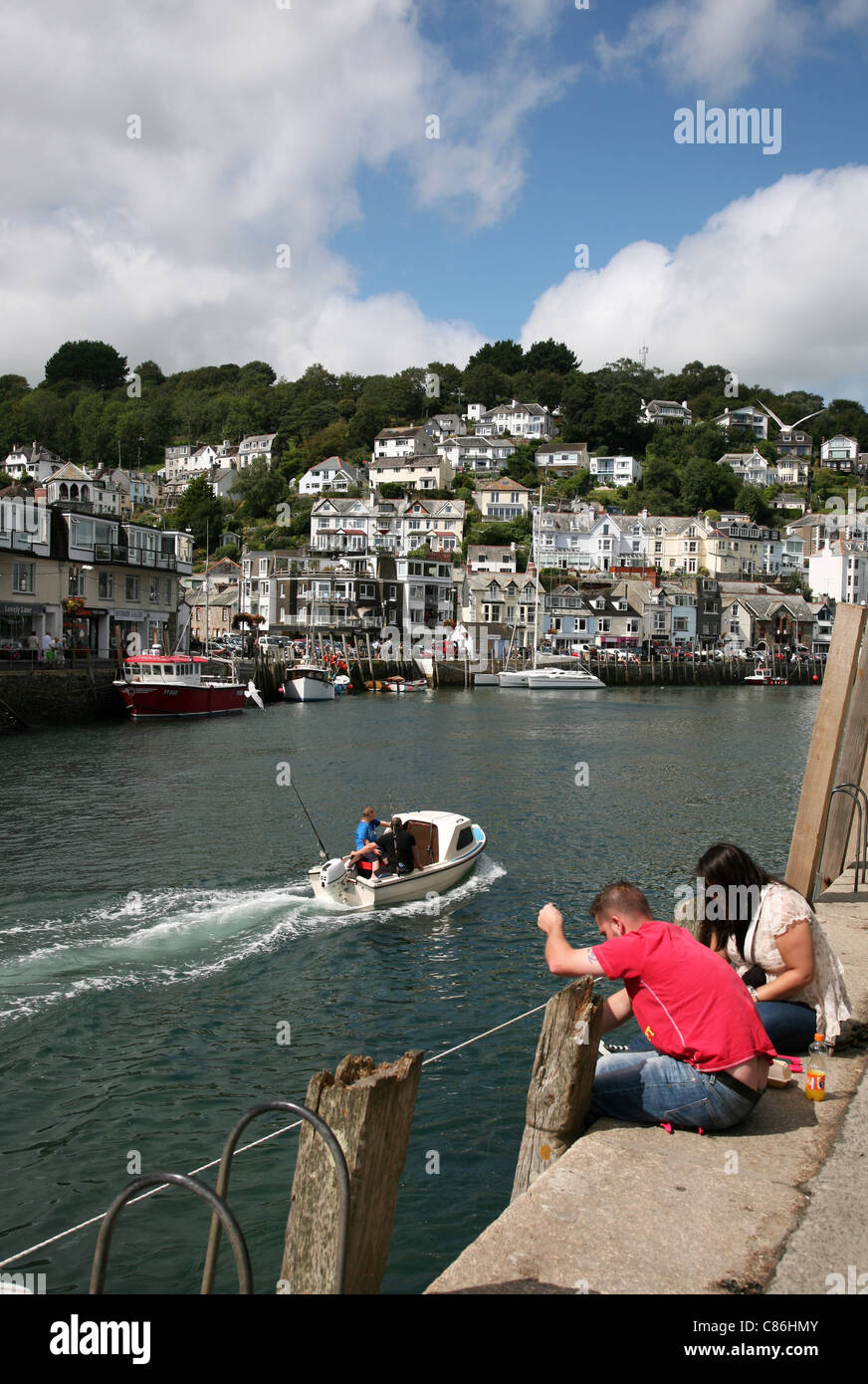 Quayside view of the River Looe passing through the popular resort of ...