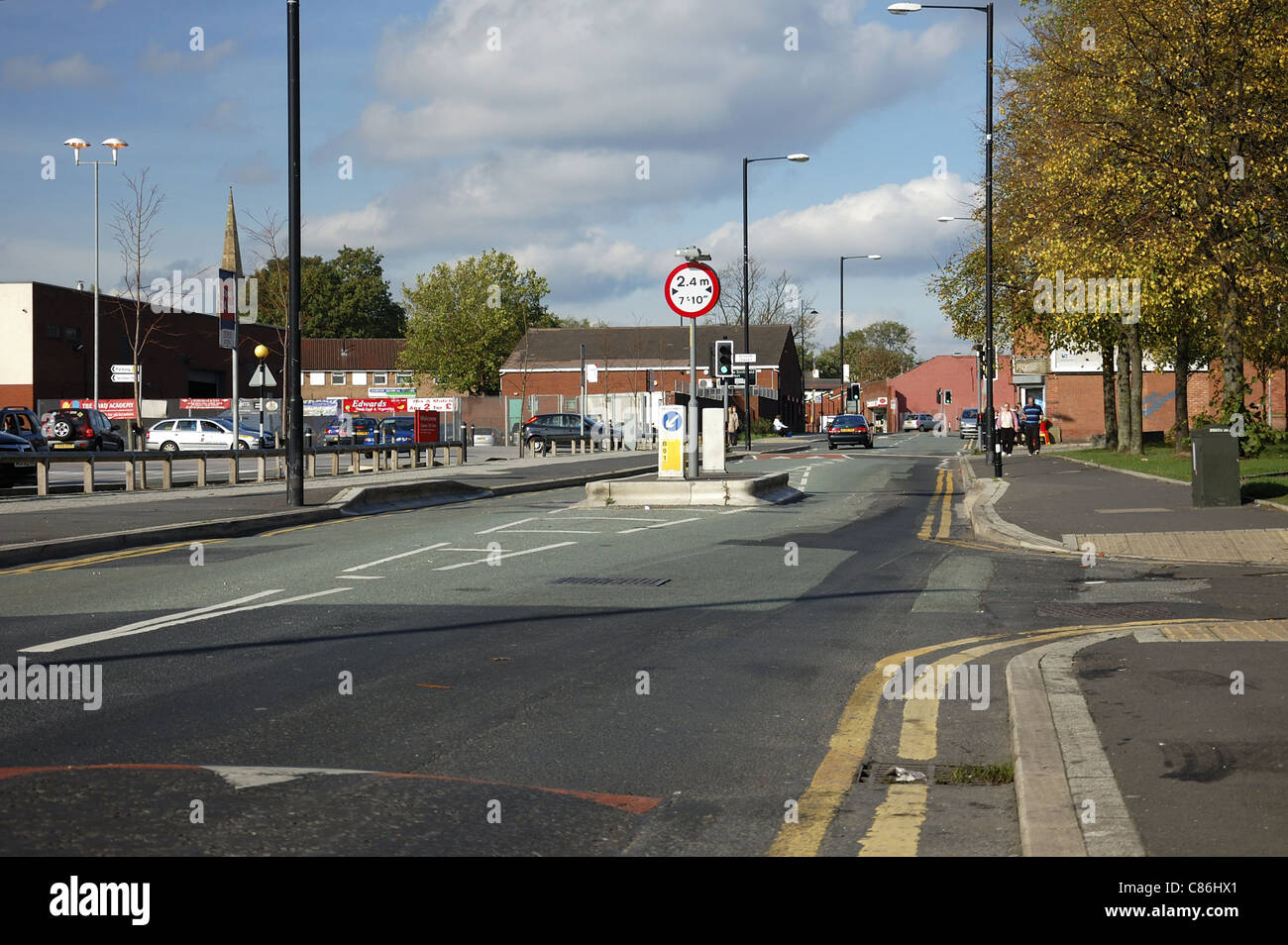 Road leading up to signal controlled junction Stock Photo - Alamy