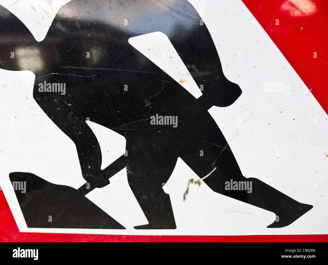 Men at work road sign from a close angle Stock Photo - Alamy