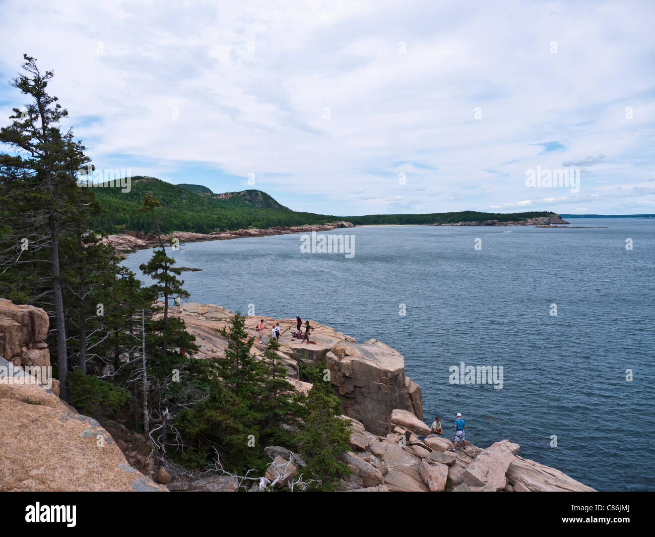 Rock climbers at Otter Cliffs with a view to Great Head in Arcadia ...