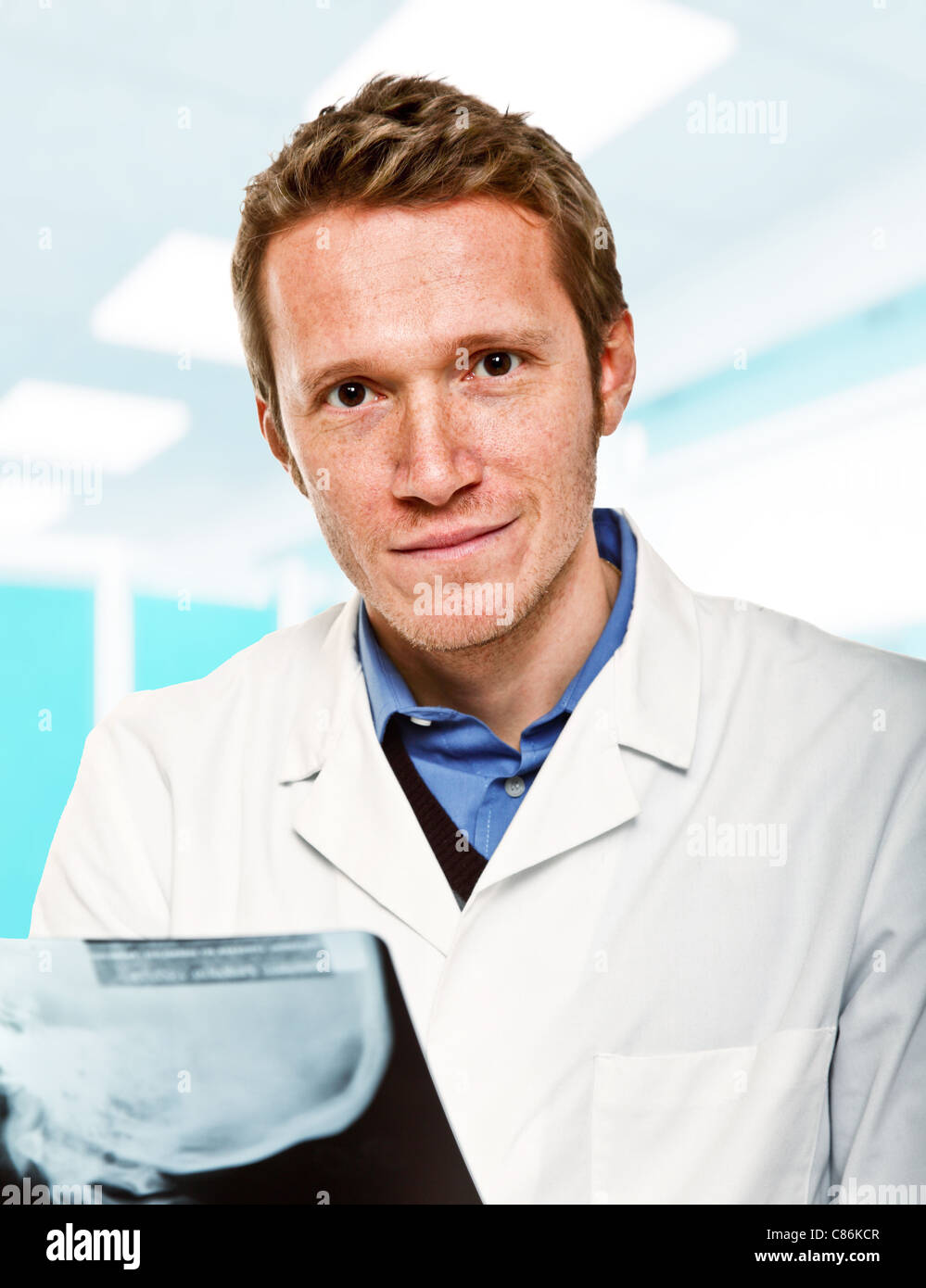 young confident medic hold xray Stock Photo - Alamy