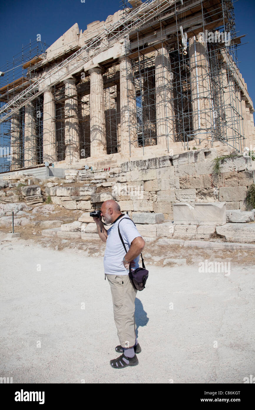 Tourists and visitors at the ancient Greek temples at Acropolis of ...