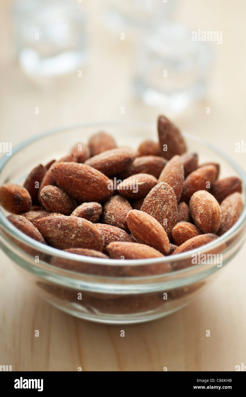 Salted almonds in a dish Stock Photo - Alamy