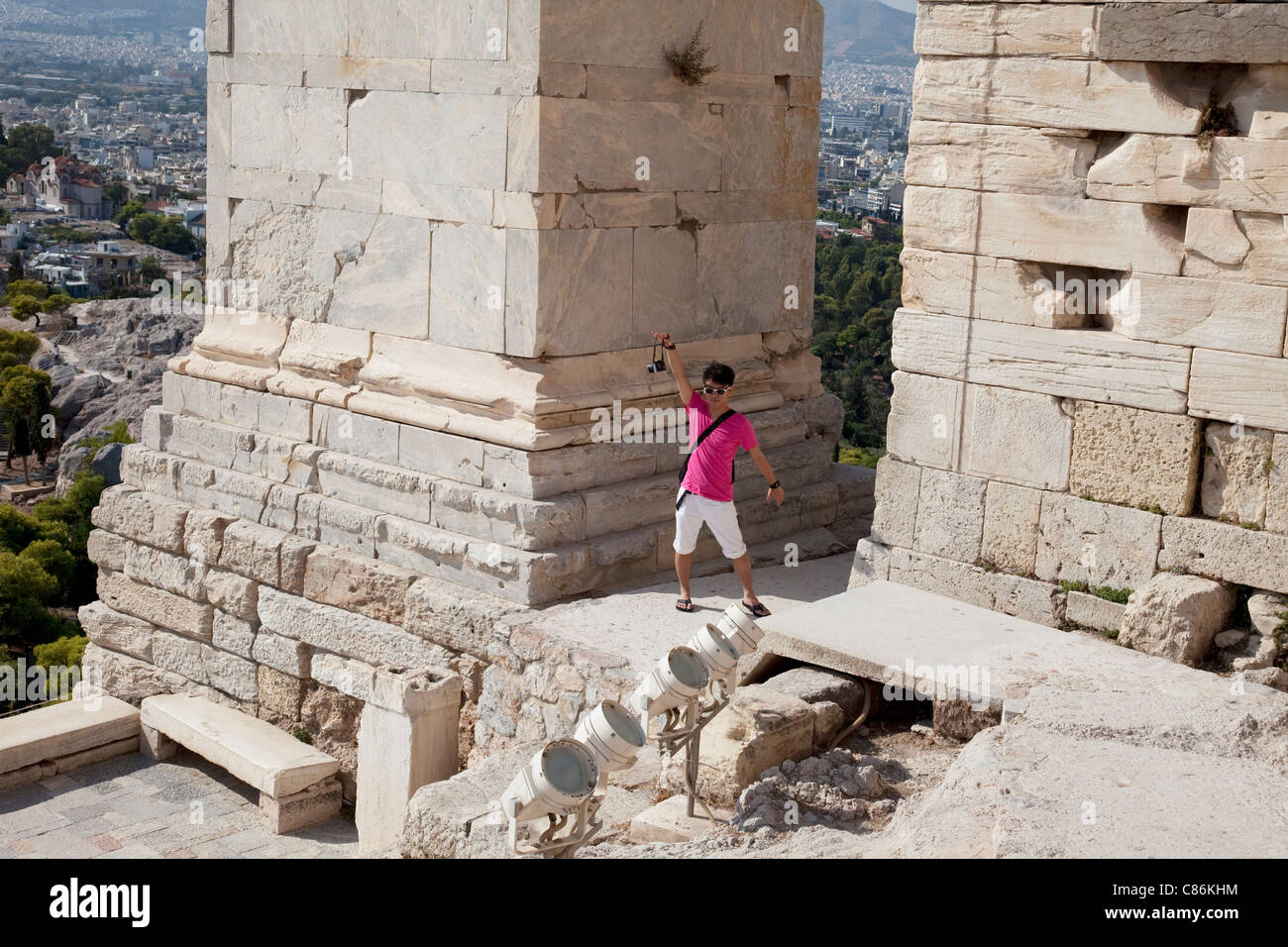 Tourists and visitors at the ancient Greek temples at Acropolis of ...