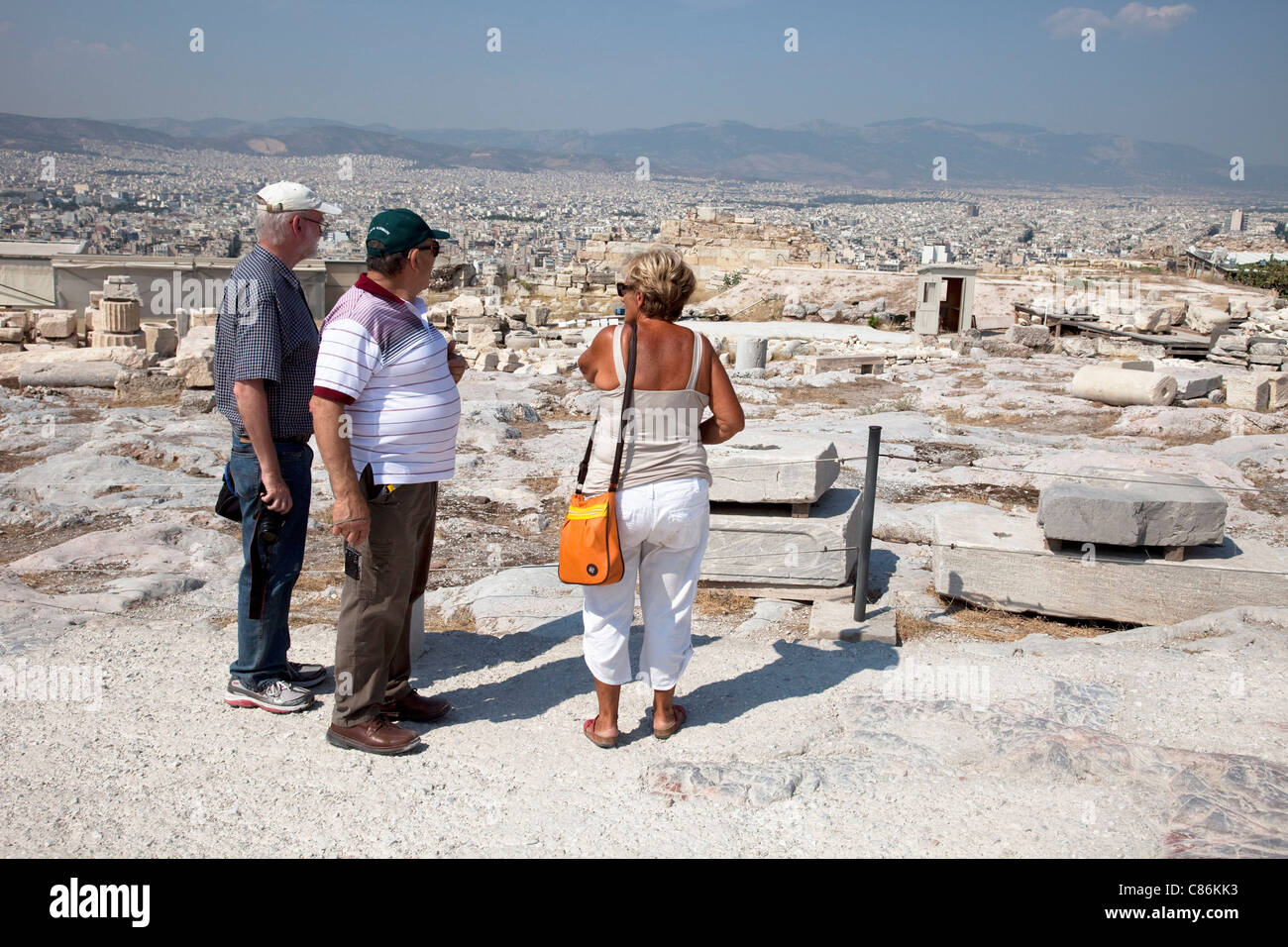 Tourists and visitors at the ancient Greek temples at Acropolis of ...