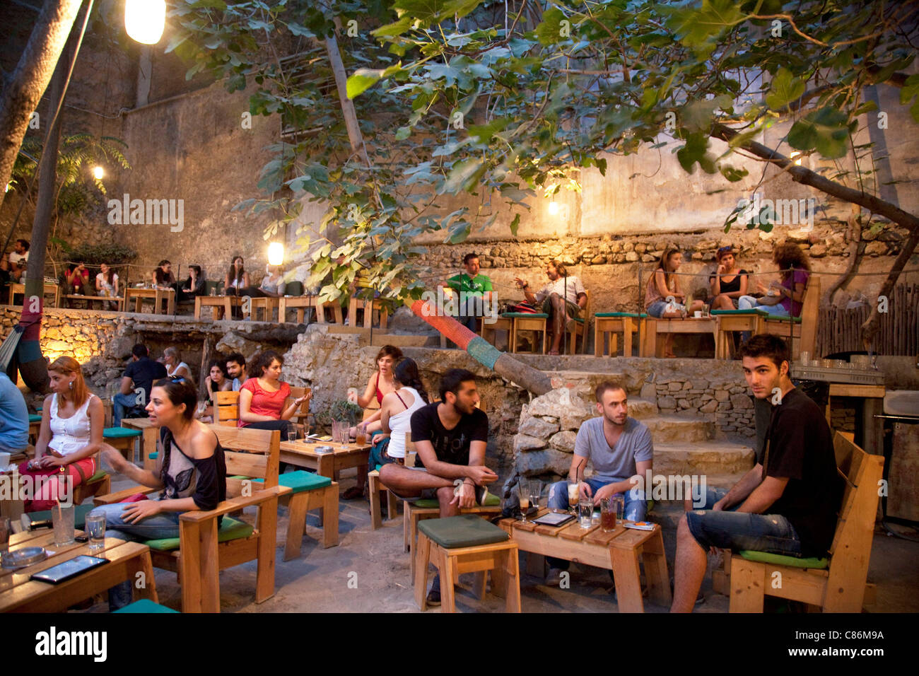 People at Six Dogs a trendy outdoor bar in the Monastiraki area. six d ...