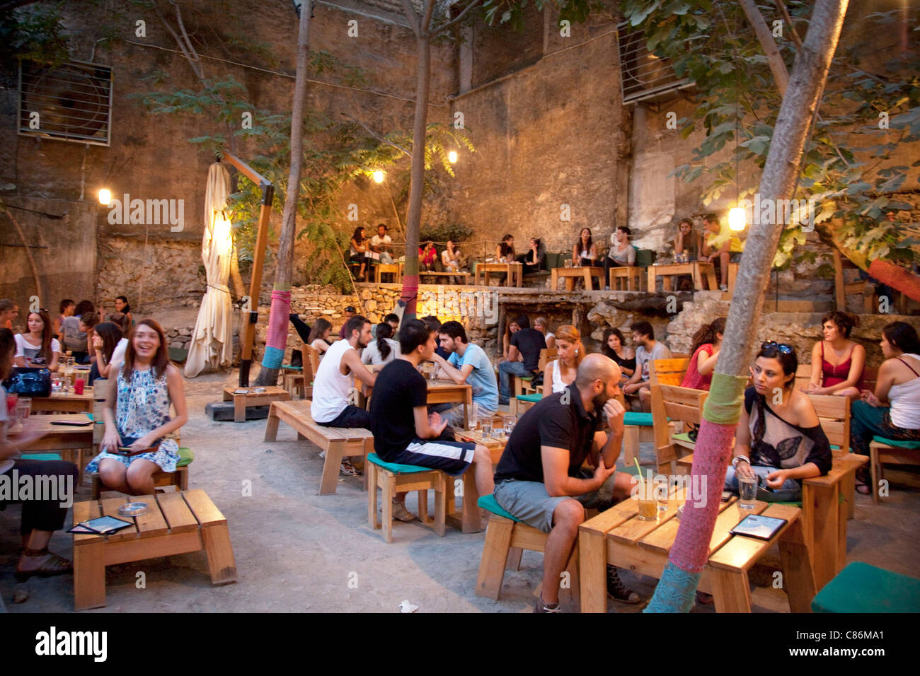 People at Six Dogs a trendy outdoor bar in the Monastiraki area. six d ...