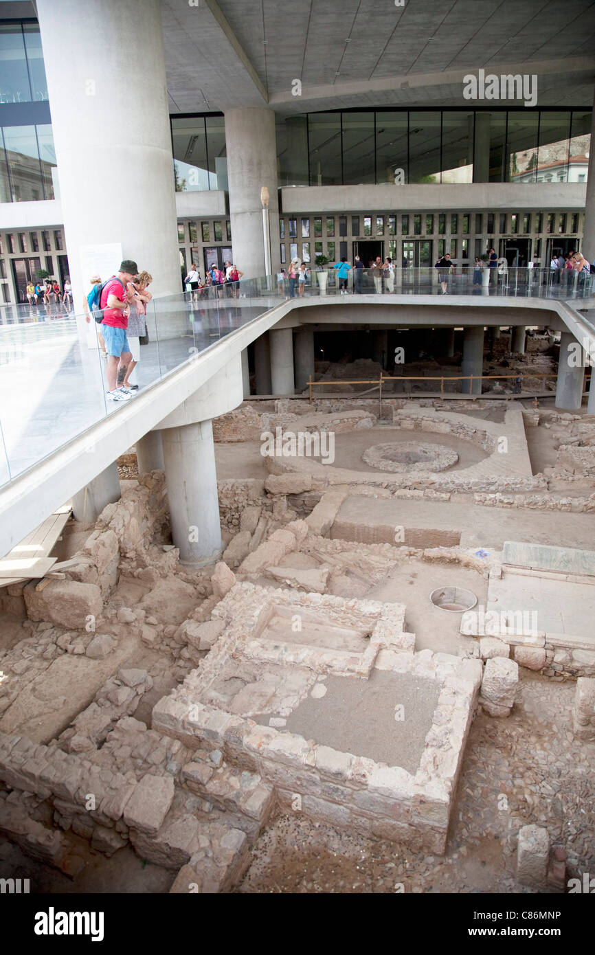 Excavations of ancient ruins outside the modern Acropolis Museum ...