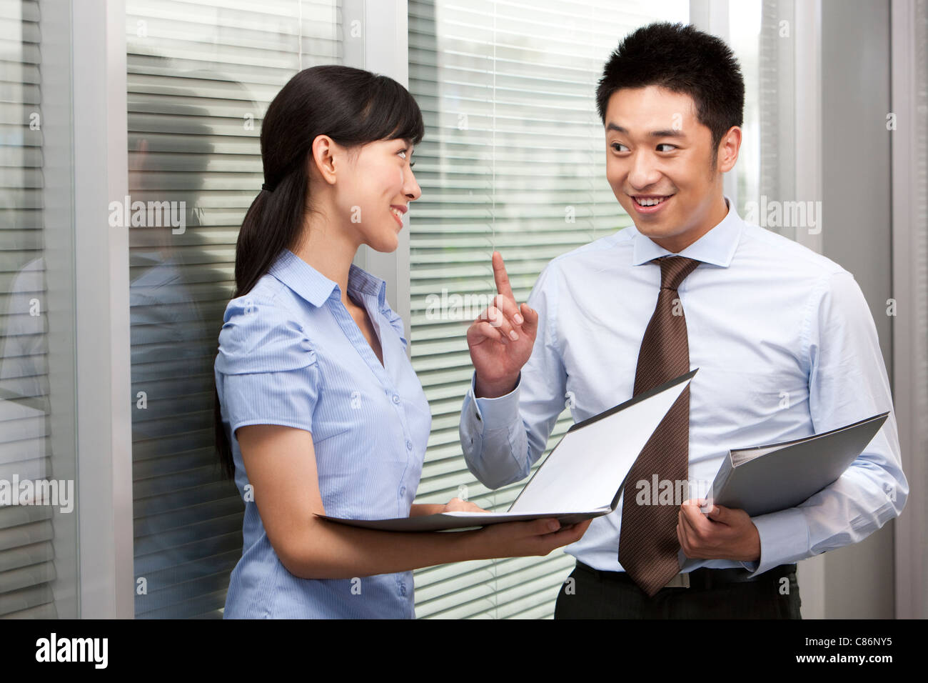 Colleagues Working Together Stock Photo - Alamy