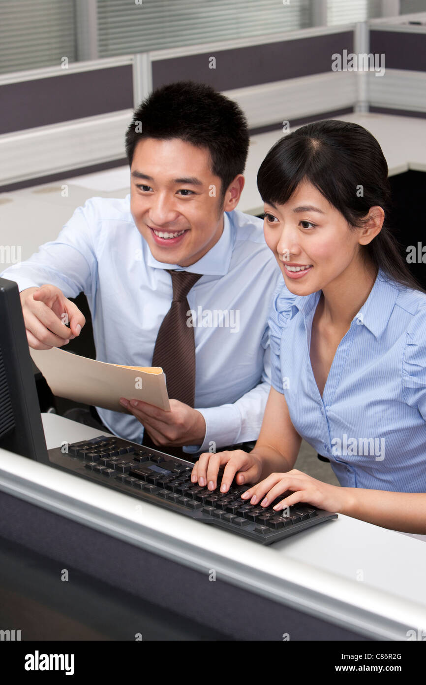 Colleagues Working Together Stock Photo - Alamy