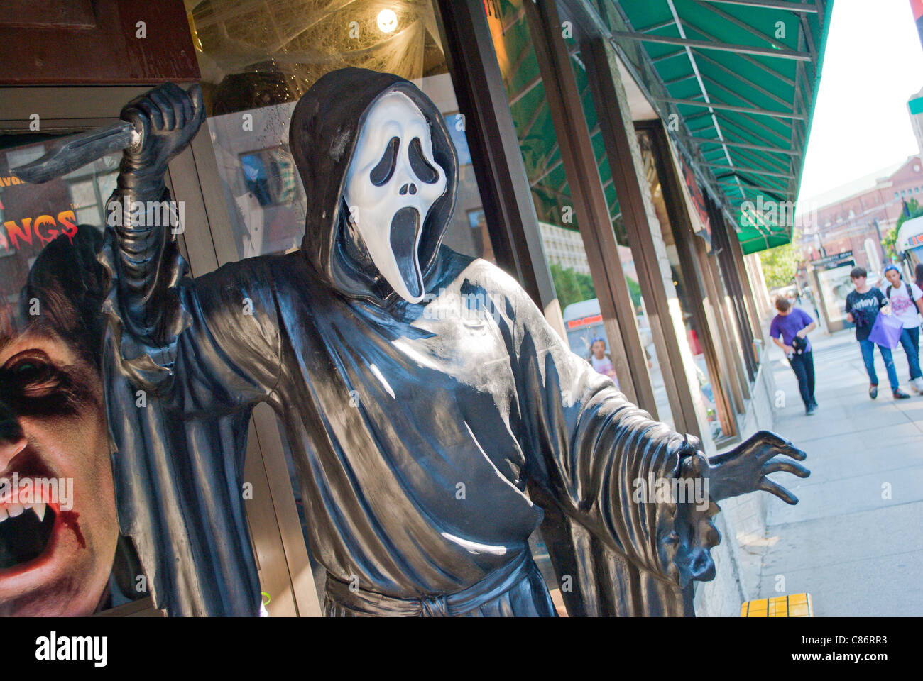 Scary figure on the street Stock Photo - Alamy