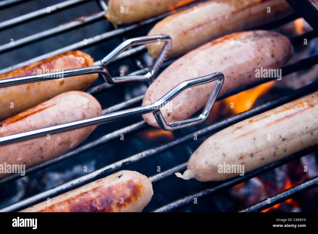 Juicy sausages grill on barbecue hi-res stock photography and images ...