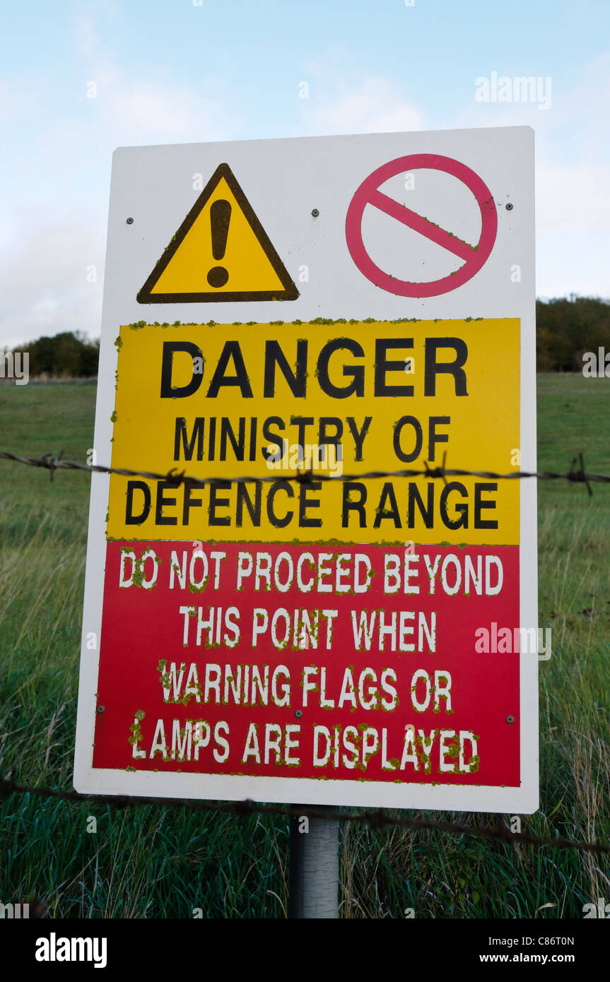 Warning sign at a MOD training and firing range Stock Photo - Alamy