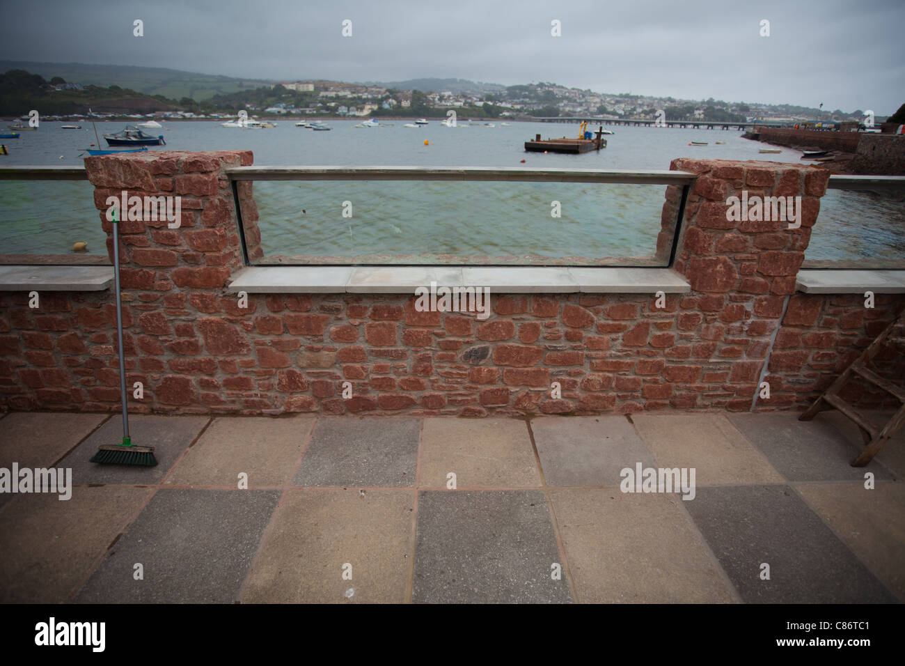Flood defence windows installed in a stone wall Stock Photo - Alamy