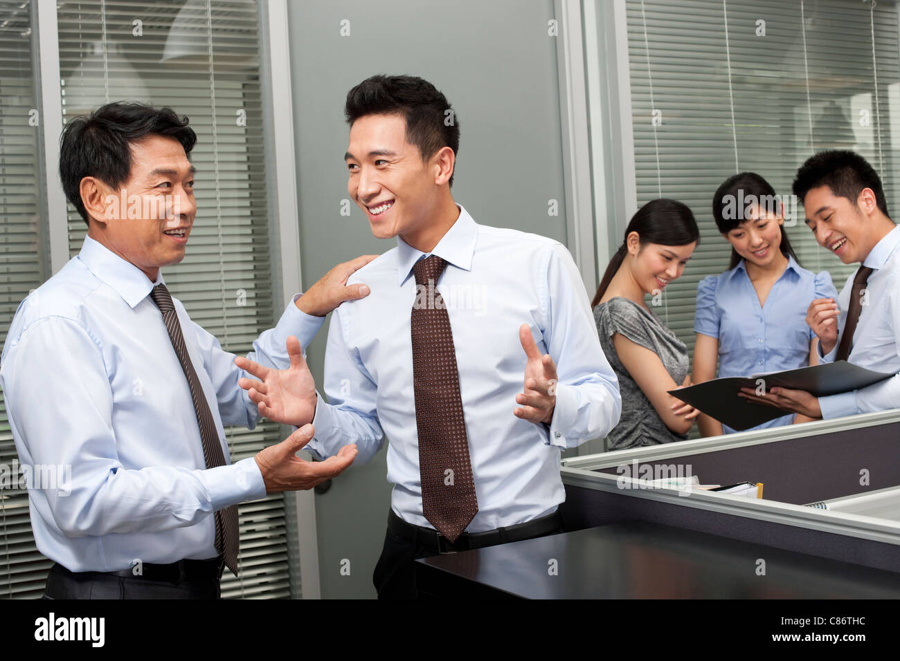 Standing communication smiling arms up looking away authority ...