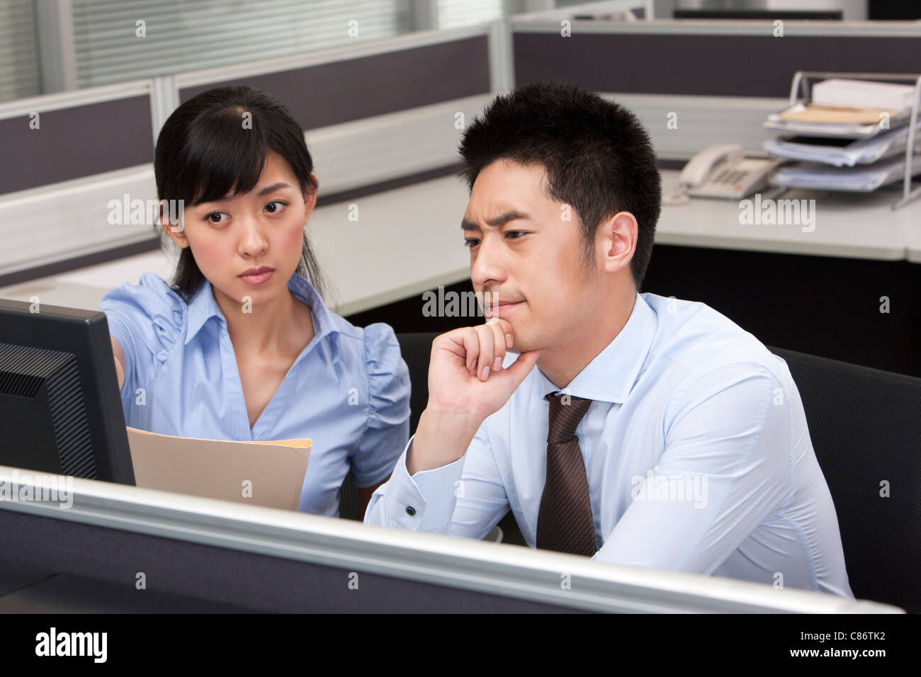 Colleagues Working Together Stock Photo - Alamy
