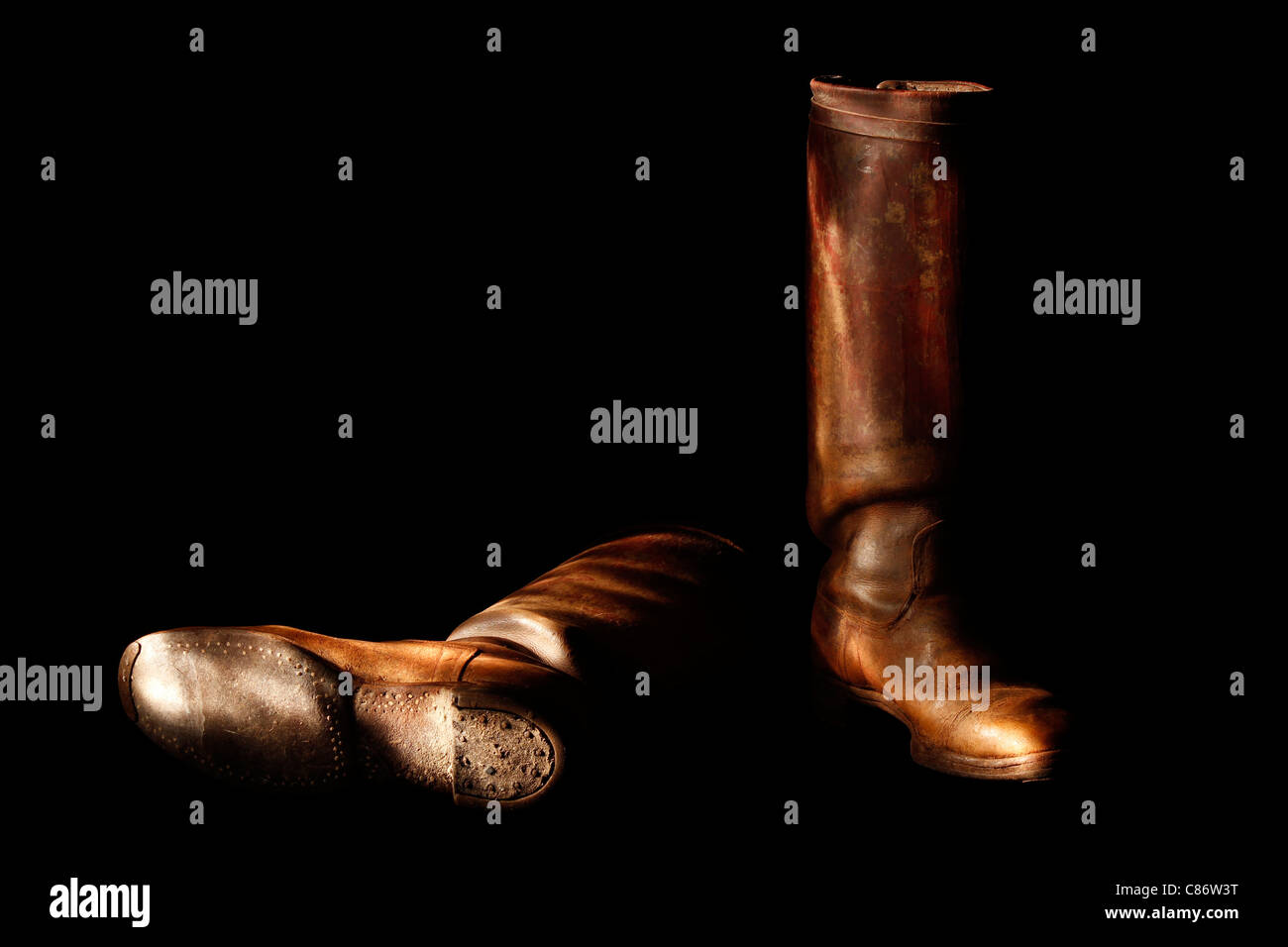 Leather boots in a low-key shot Stock Photo - Alamy