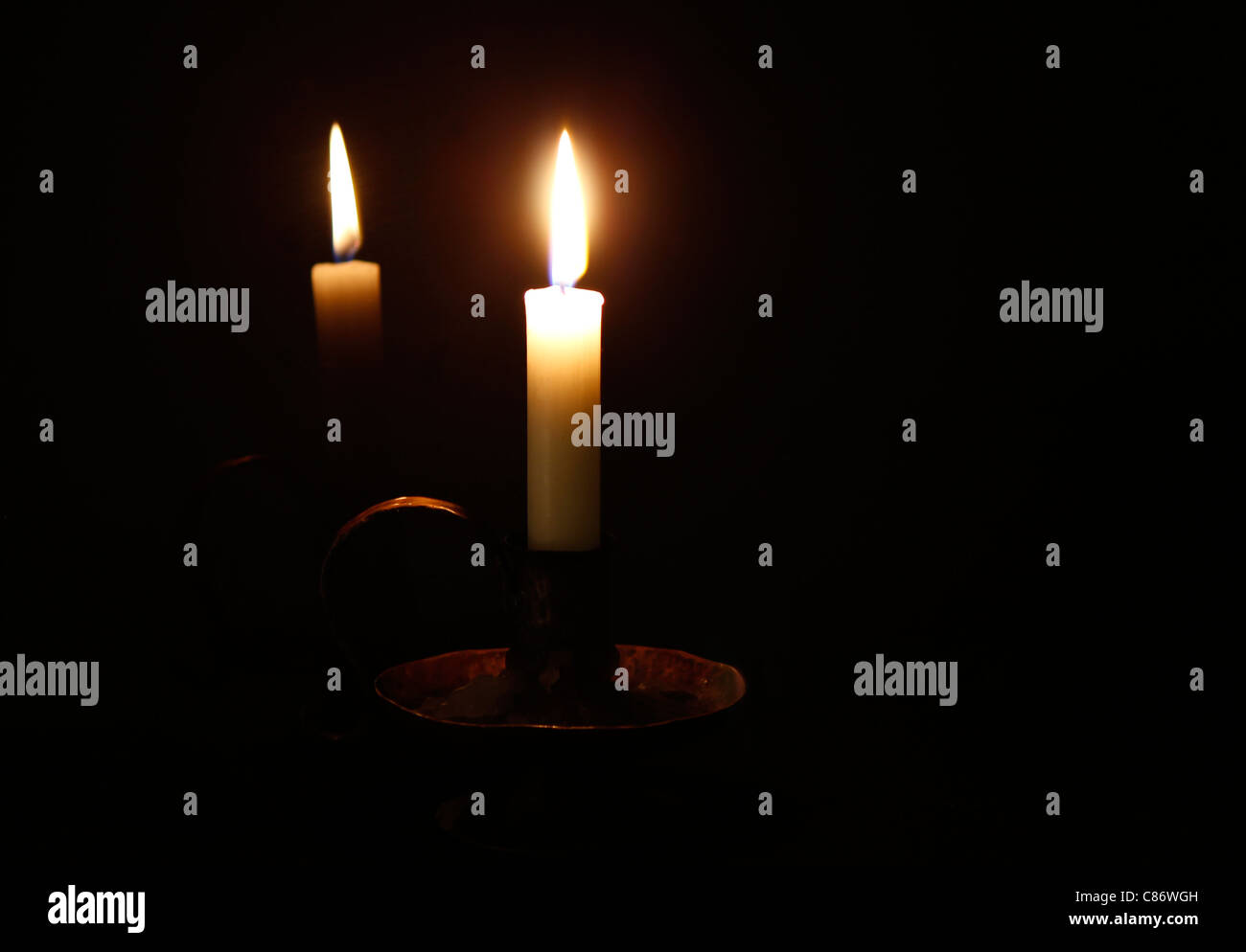 A candle in a mirrow Stock Photo - Alamy
