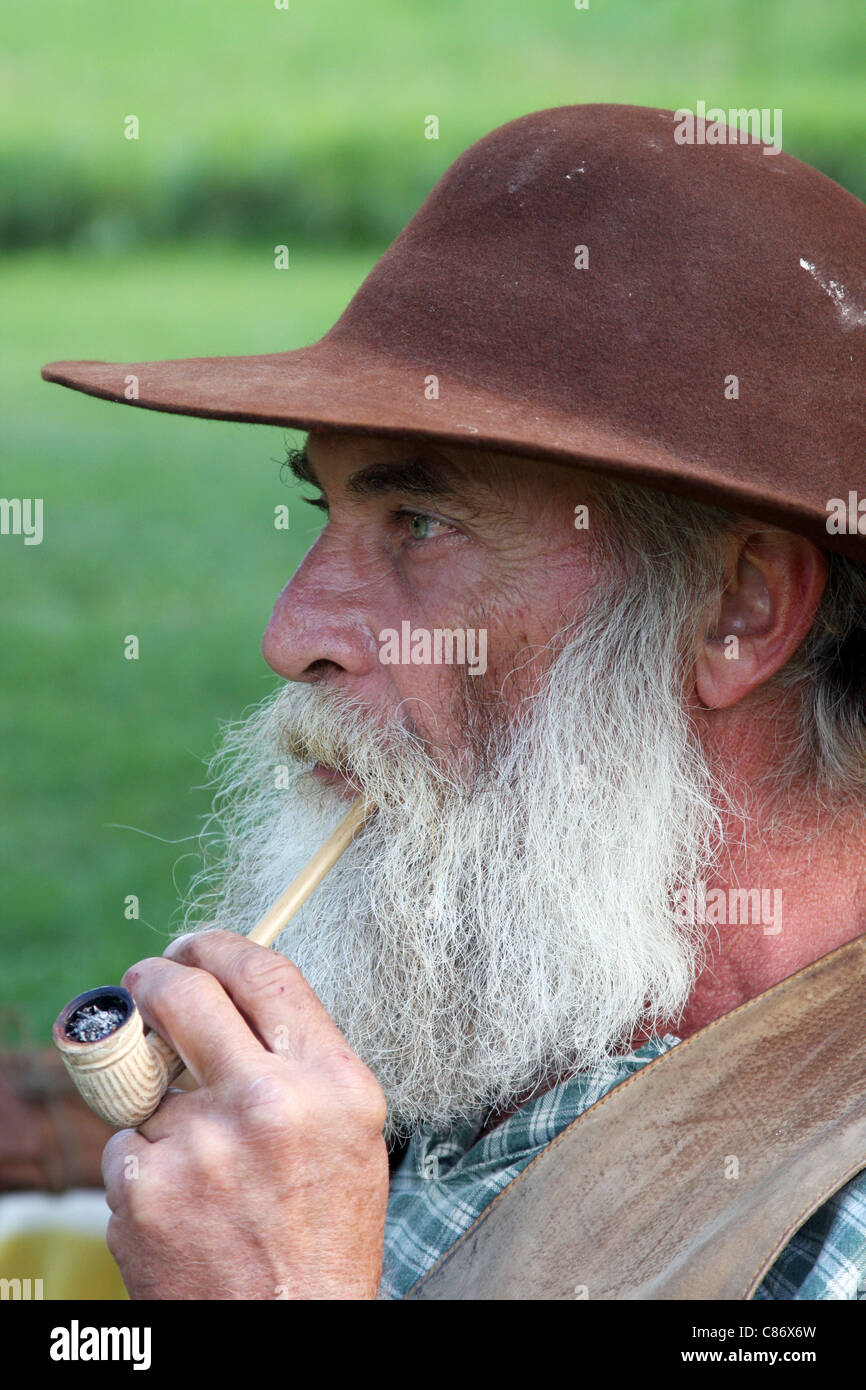 A man smoking a pipe Stock Photo - Alamy