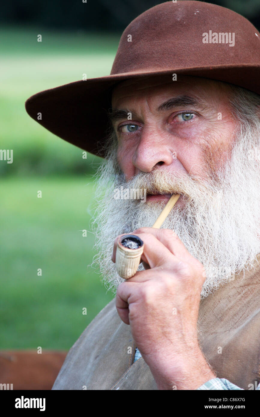 A man smoking a pipe Stock Photo - Alamy