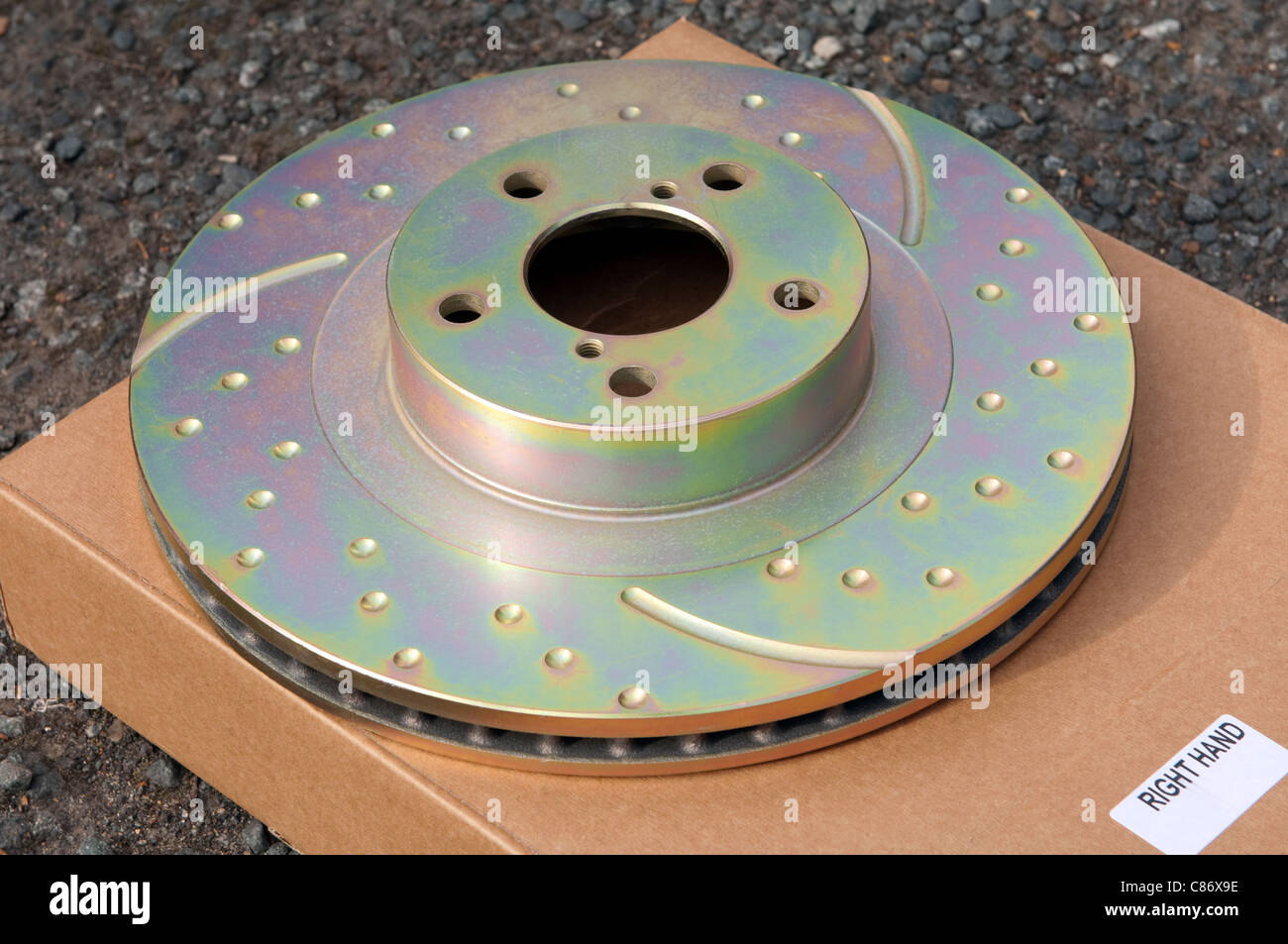 High performance vented car brake disc ready to be fitted Stock Photo ...