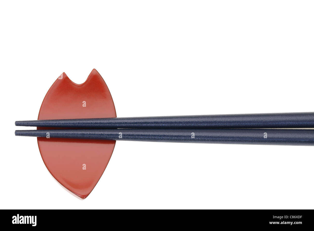 Chopstick and chopstick-rest isolated on a white background Stock Photo ...